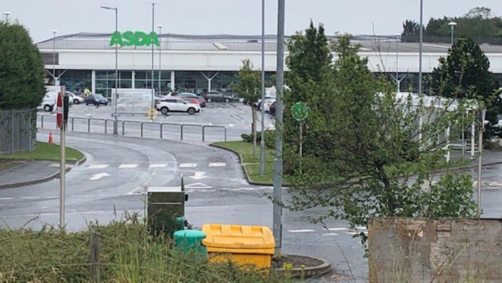 Man allegedly wielding axe forces Asda store to close | STV News