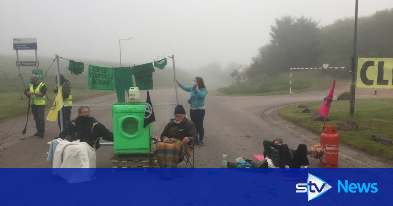 Climate activists block power station with washing machine | STV News