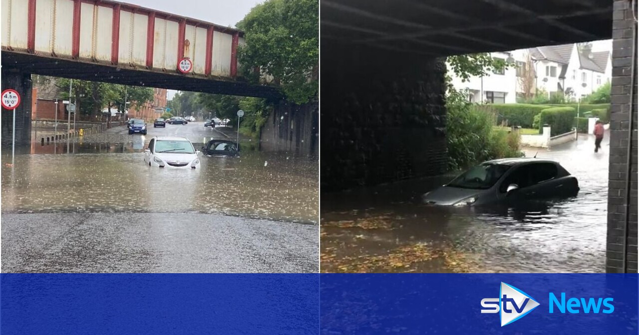 Torrential rain floods roads and forces drivers to abandon cars | STV News