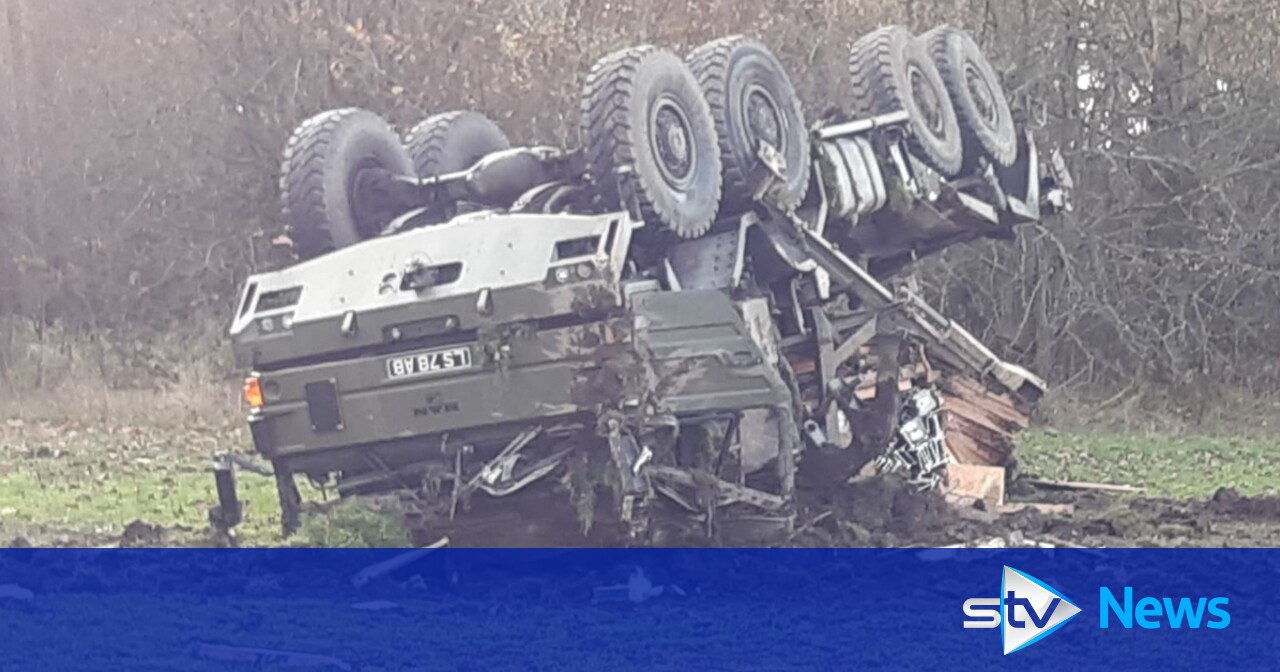 Two injured after Army truck crashes and overturns on roundabout | STV News