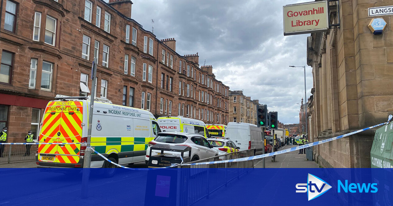 Man taken to hospital after police lock down street amid flat ...