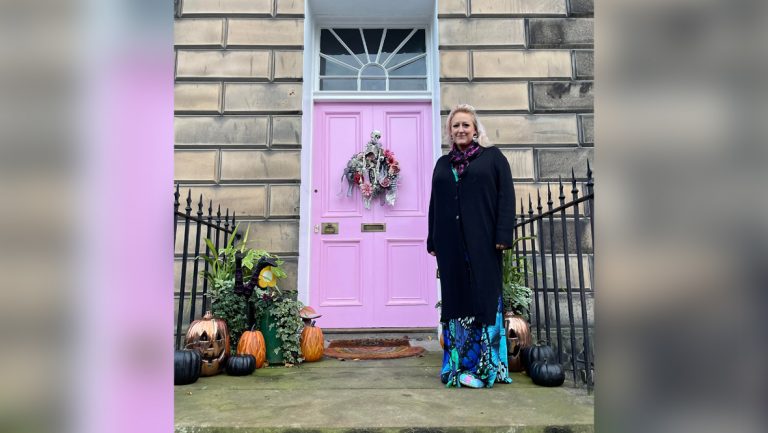 Pink door woman finally wins paint colour approval following battle ...