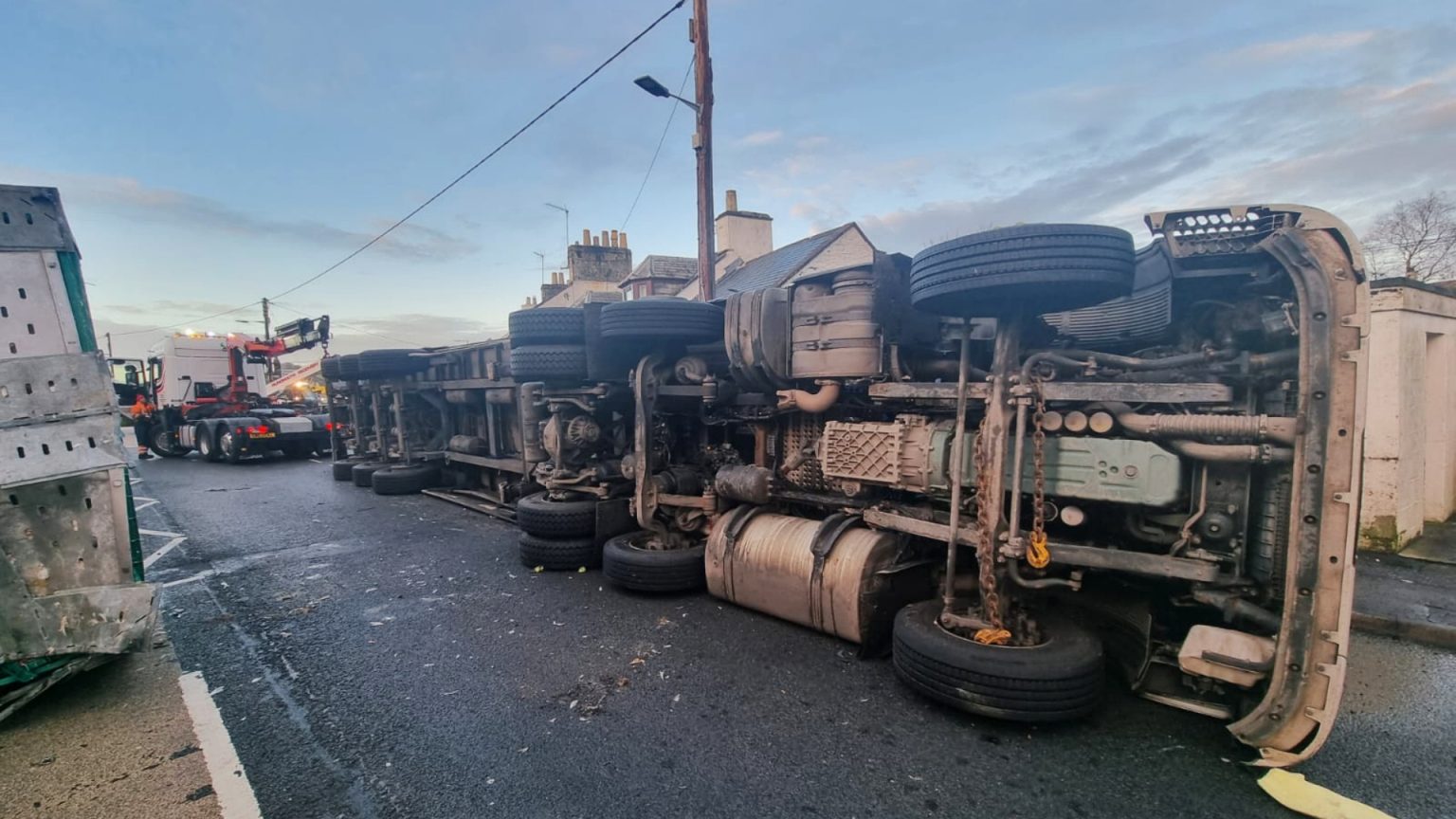 Man in hospital after crash between two lorries and three cars in ...