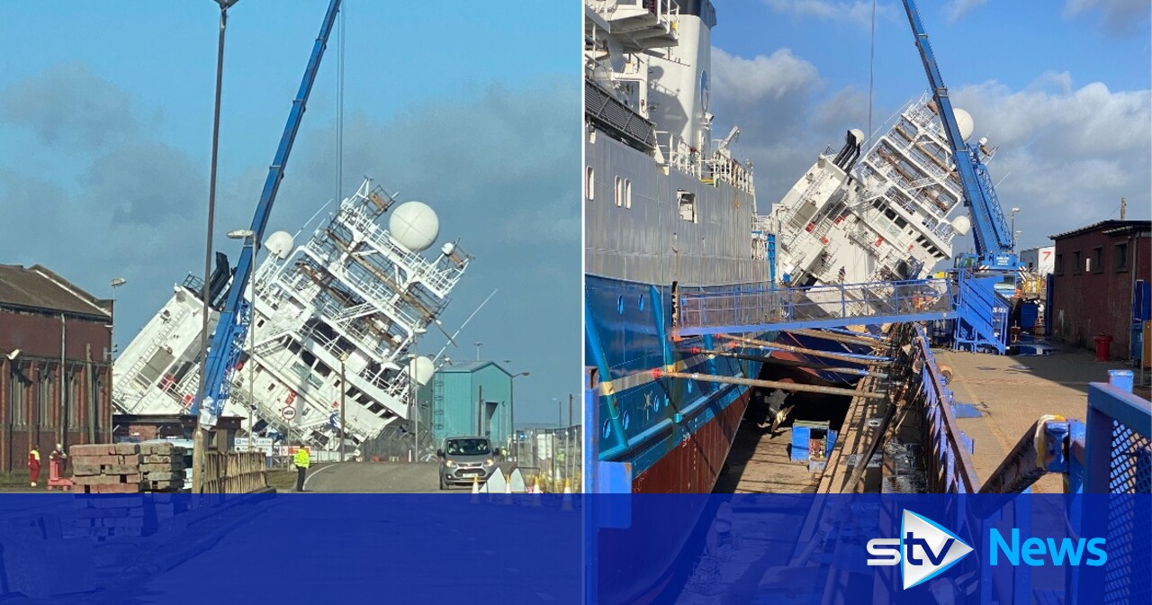 Major rescue operation as ship tips after dislodging from dry dock in ...