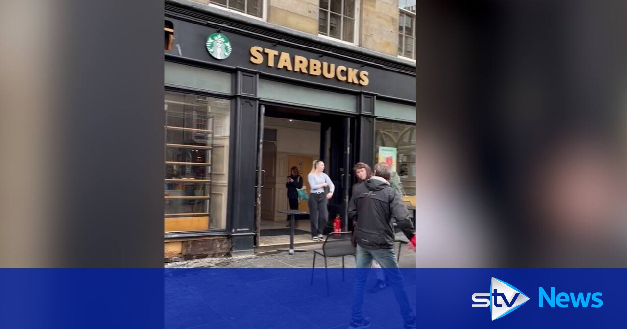 Firefighters tackle blaze after fire breaks out at Starbucks on ...