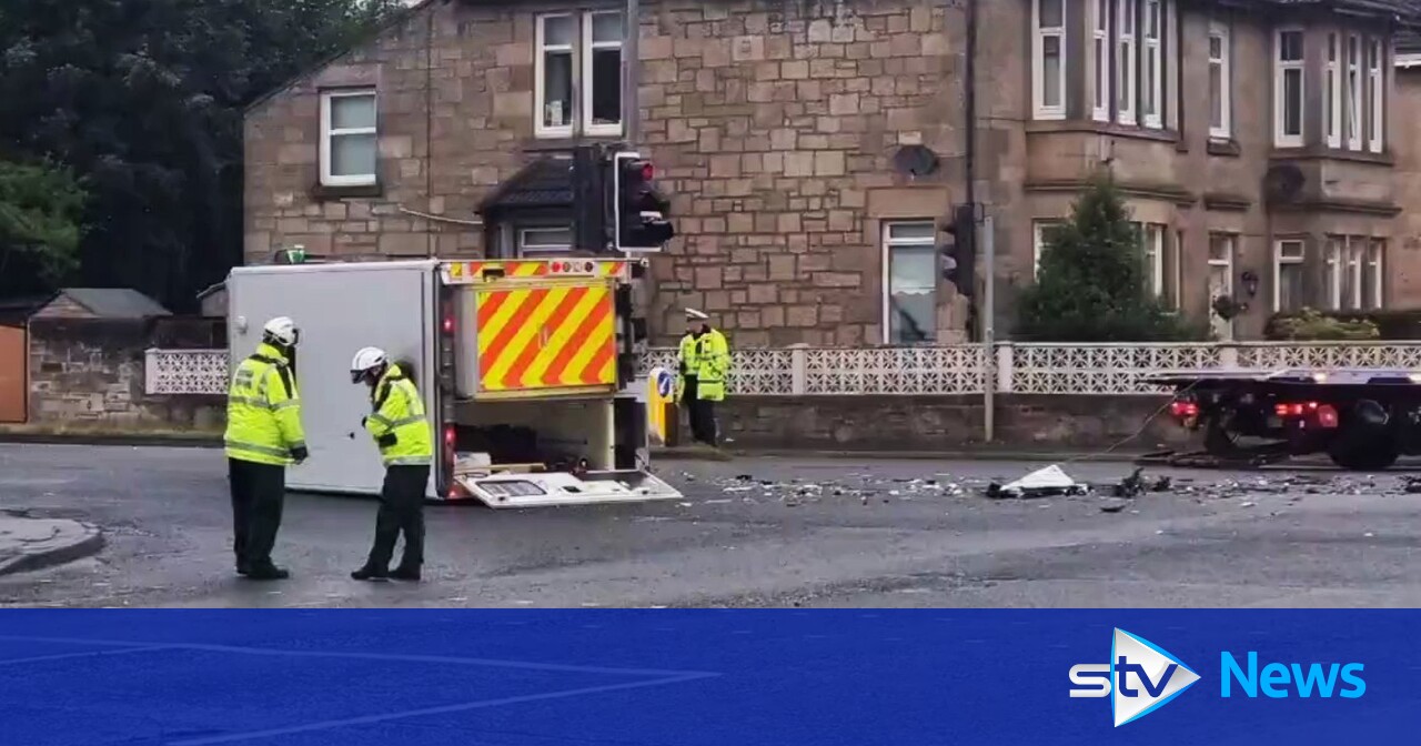 Patient and paramedics rushed to hospital after ambulance flips onto ...