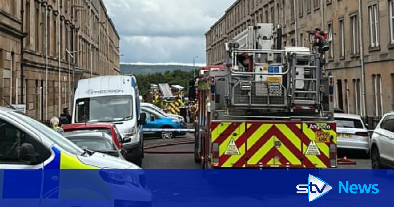 Four people in hospital after fire rips through Glasgow tenement block ...