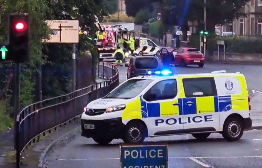 Patient and paramedics rushed to hospital after ambulance flips onto ...