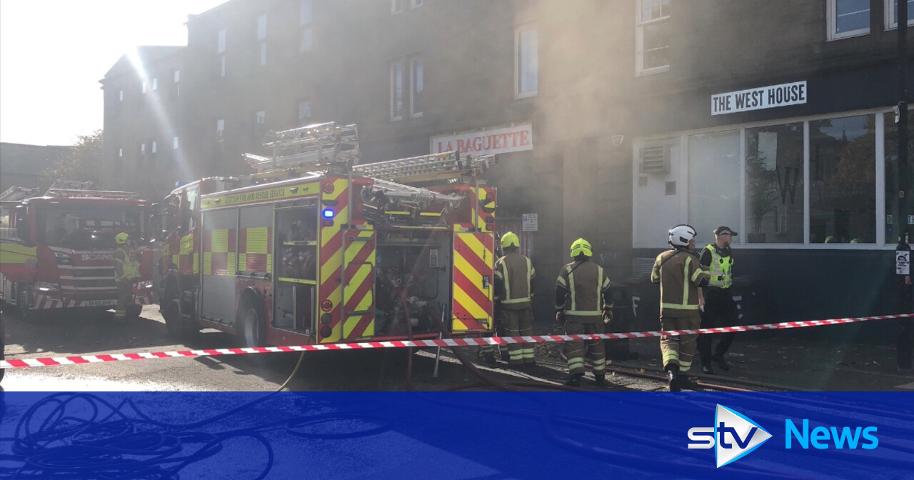 Three people treated for smoke inhalation as fire crews tackle blaze at ...