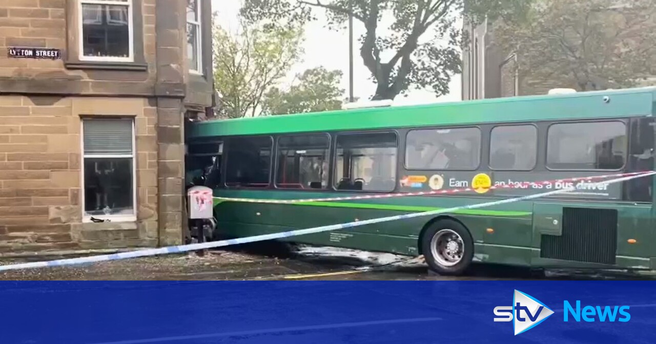 Block of flats evacuated after bus crashes into building in Dundee ...