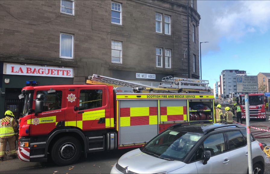 Three people treated for smoke inhalation as fire crews tackle blaze at ...