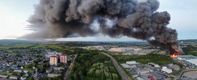 'Remain indoors and avoid area': Explosions and smoke amid fire at ...