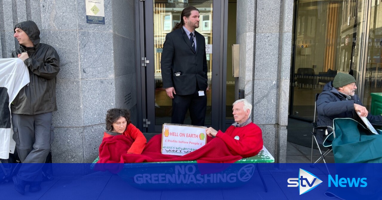 Climate campaigners stage protest at Shell Aberdeen office with washing ...
