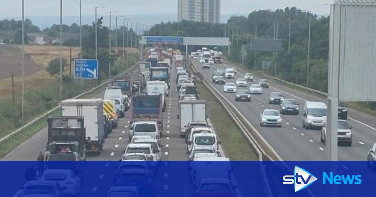 Two in hospital after car flips onto roof in multi-vehicle crash on M8 ...