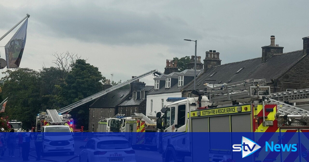 Dozens of firefighters battling blaze at two houses in Moray as A96 ...