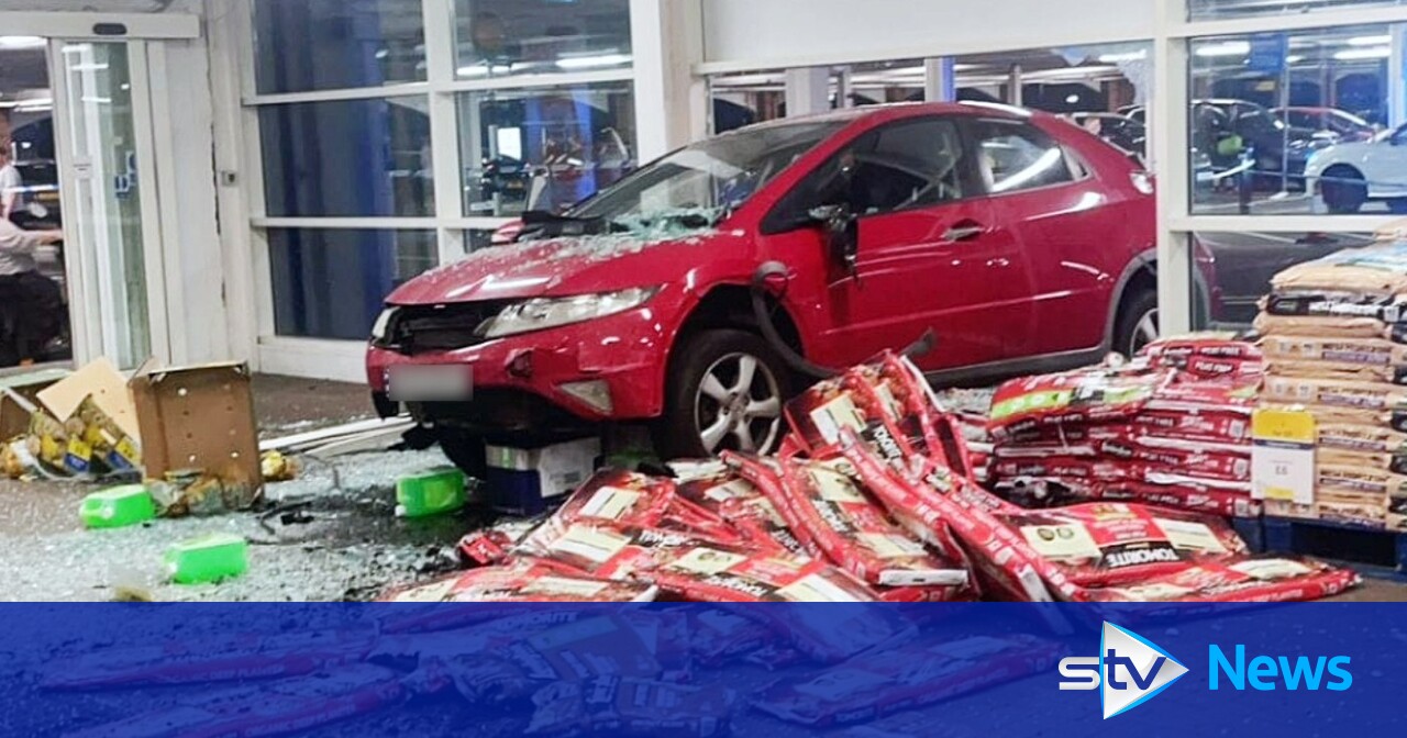 Man charged after car crashes through Tesco supermarket in Greenock ...