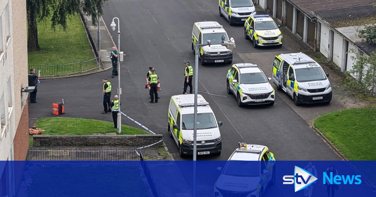Man falls from Glasgow flat block window as police cordon off street ...