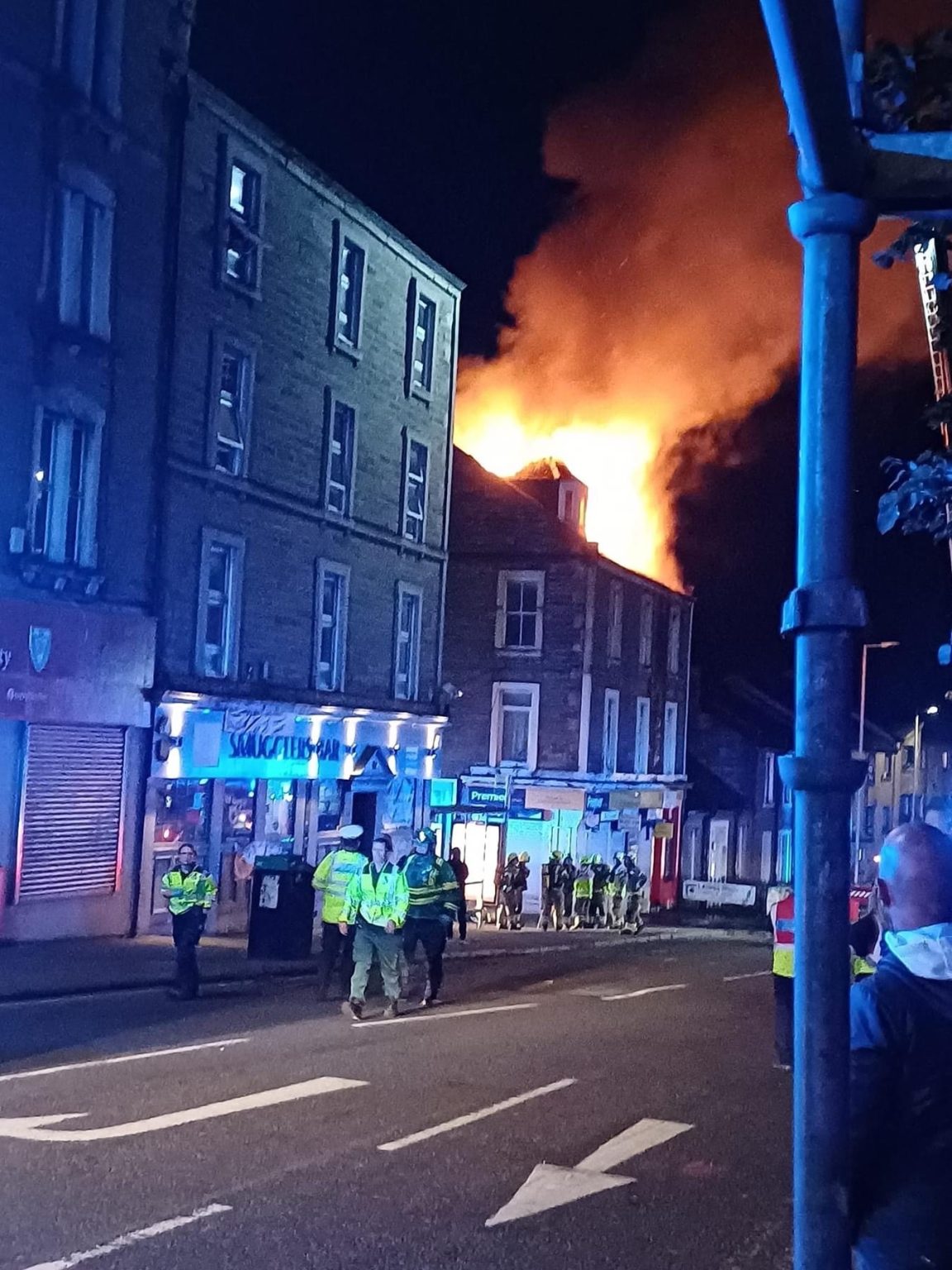 Firefighters tackle blaze at Dundee tenement block as flames shoot ...
