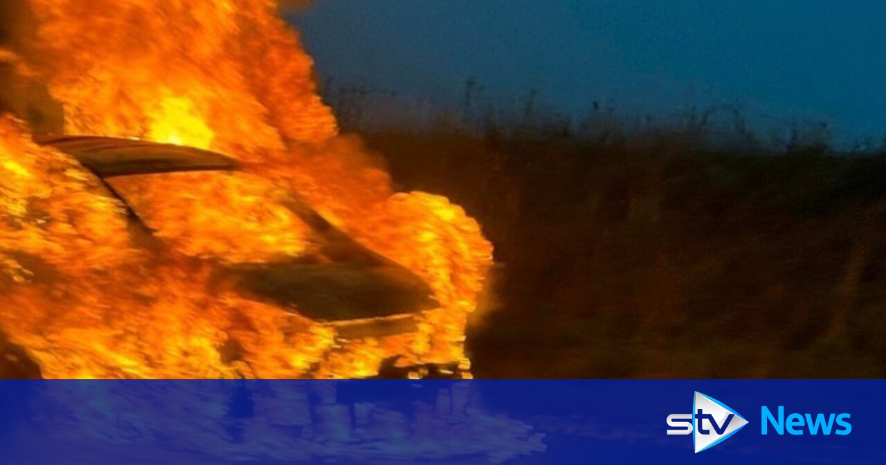 Car engulfed in flames on M90 as motorists urged to 'approach with care ...
