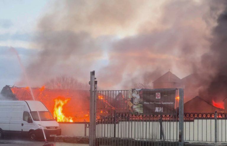 Residents return to their homes after huge blaze broke out near ...