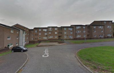 Hunt for armed gang after man dragged from home and attacked in front ...