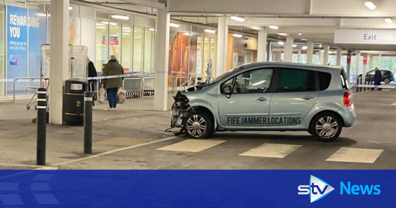 Man taken to hospital after car crashes into bollards outside Tesco in ...