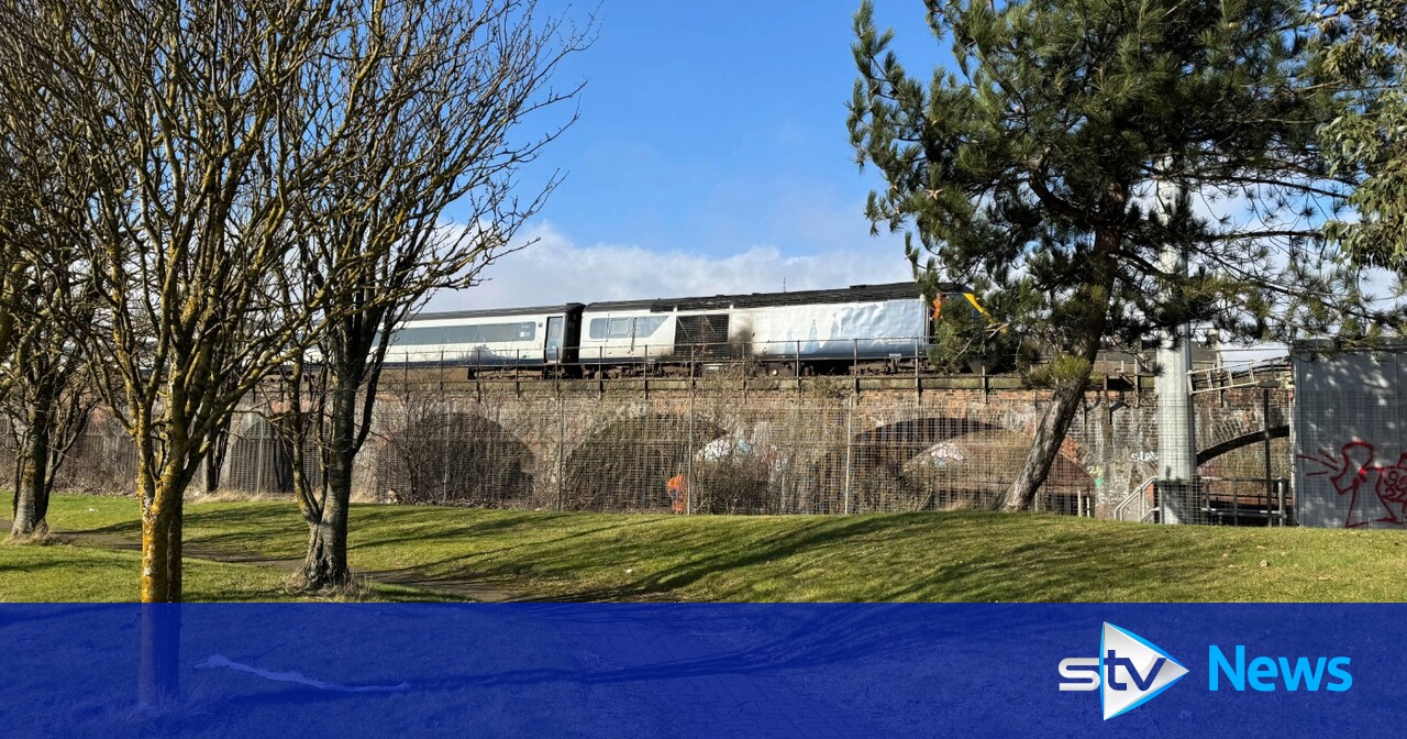 Train carriage 'catches fire' near Dundee bridge as passengers ...