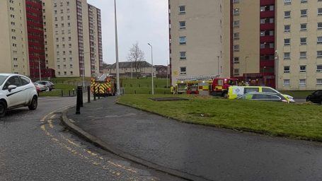 Emergency services called to Dunfermline flat block after smoke bomb ...