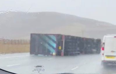 Lorry overturns on M74 with drivers urged to avoid area | STV News