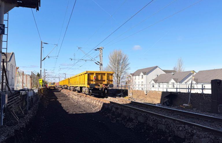Rail worker taken to hospital after crane collapses onto railway line ...
