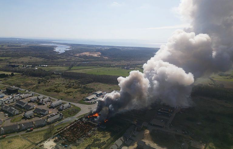 Firefighters remain at scene after battery recycling plant engulfed by ...