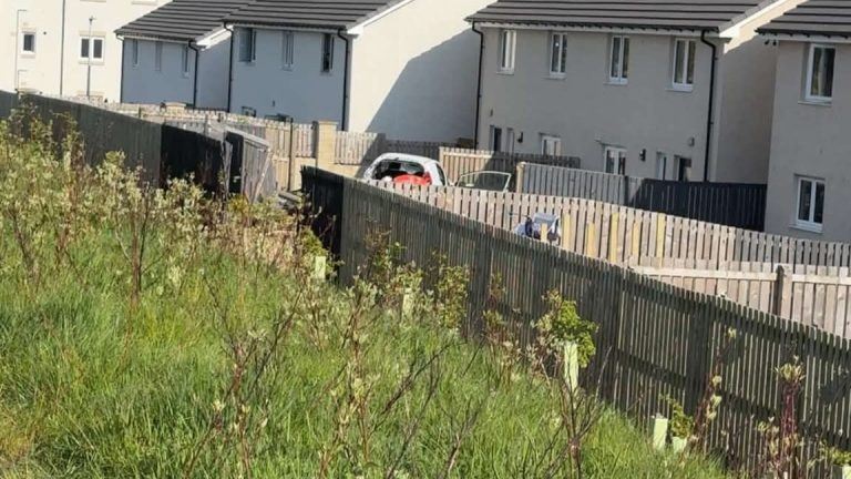 Car crashes into back garden after police chase through Dunfermline ...