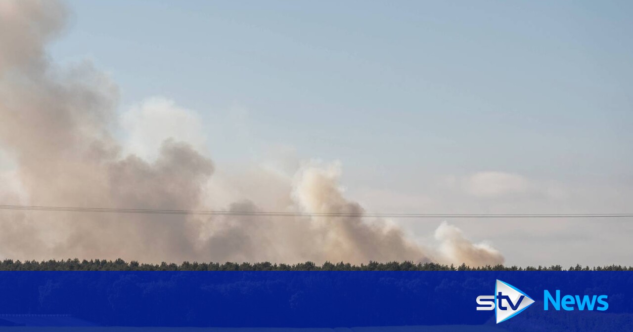 Dozens of firefighters tackling Forres wildfire as locals urged to ...