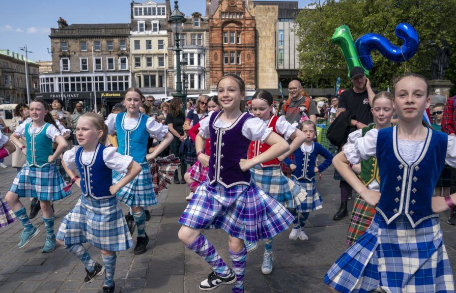 Hundreds march in colourful costumes for Edinburgh’s first Tartan ...
