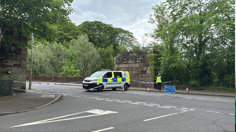 Road closed after body found as police launch unexplained death probe | STV News