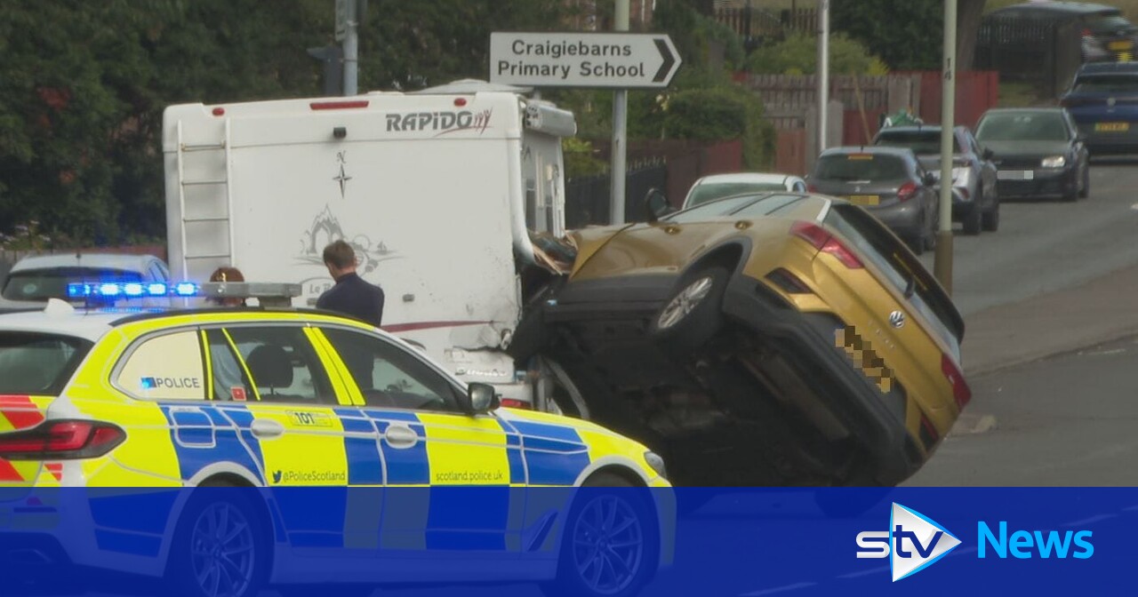 Person freed from overturned car in Dundee after crash with campervan | STV News
