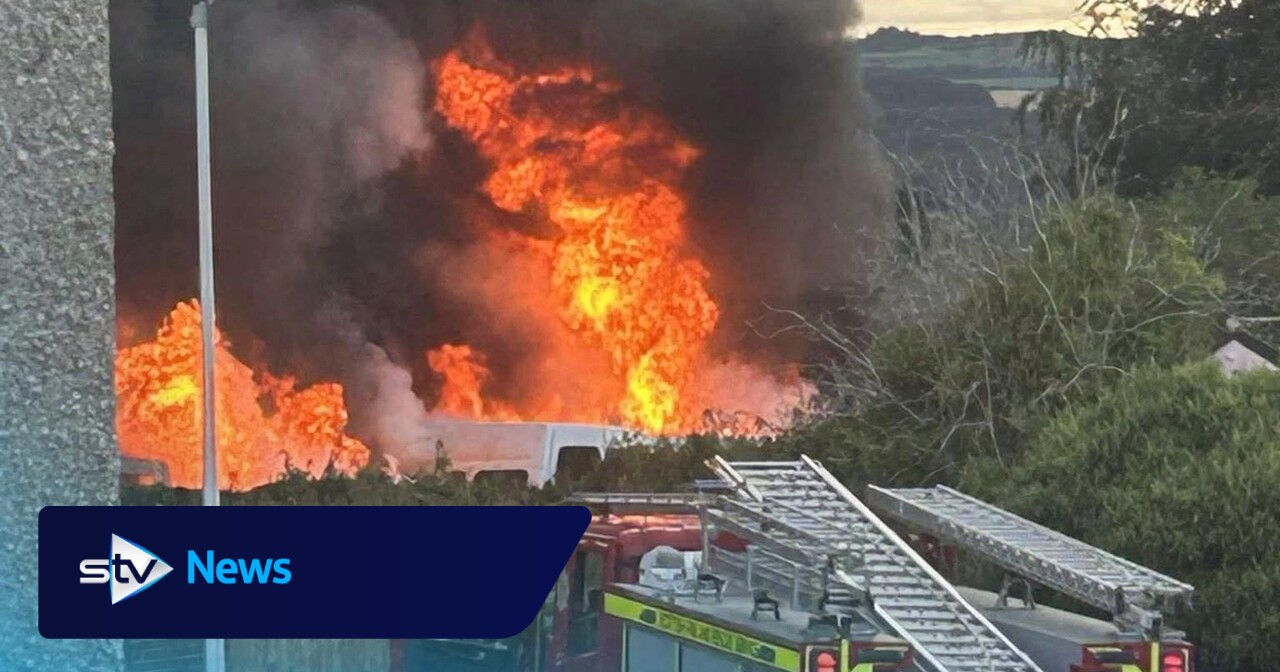Fire crews battle blaze in Inverkeithing car park after vans destroyed ...