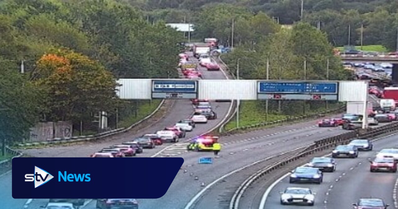 M8 and M77 closures in place after lorry crashes and sheds load of wood onto carriageway | STV News