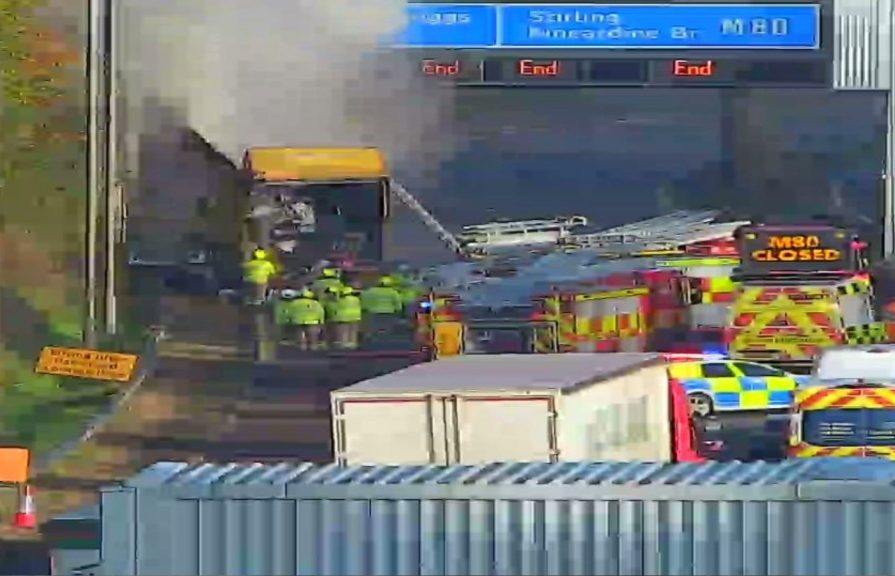 Lorry engulfed by fire on M80 causes M8 traffic jam | STV News