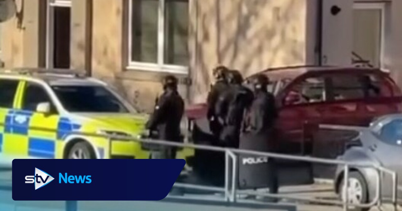 Woman, 37, charged after armed police raid Aberdeen homes | STV News