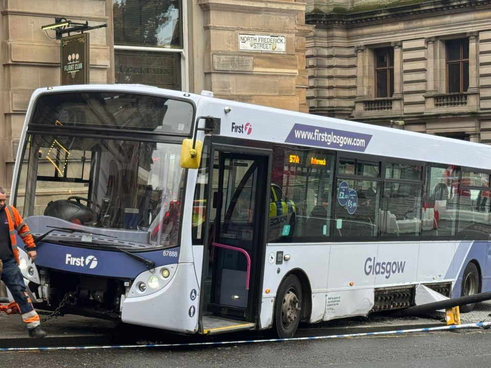 Driver in hospital after bus crashes into building on George Square in ...