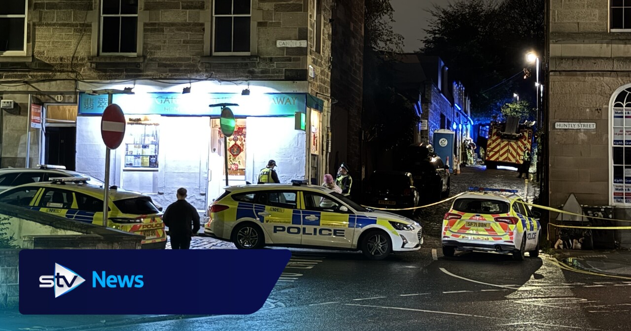 Edinburgh street taped off as four fire engines tackle house blaze ...