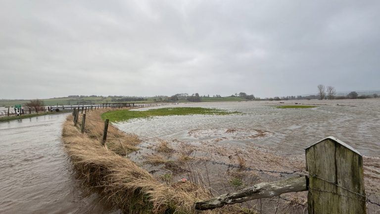 Heavy rain continues to cause flooding and travel disruption across ...