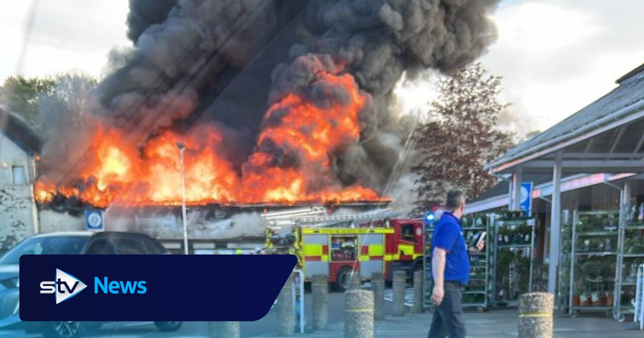 Firefighters tackle 'well-developed' blaze at Uddingston car garage ...
