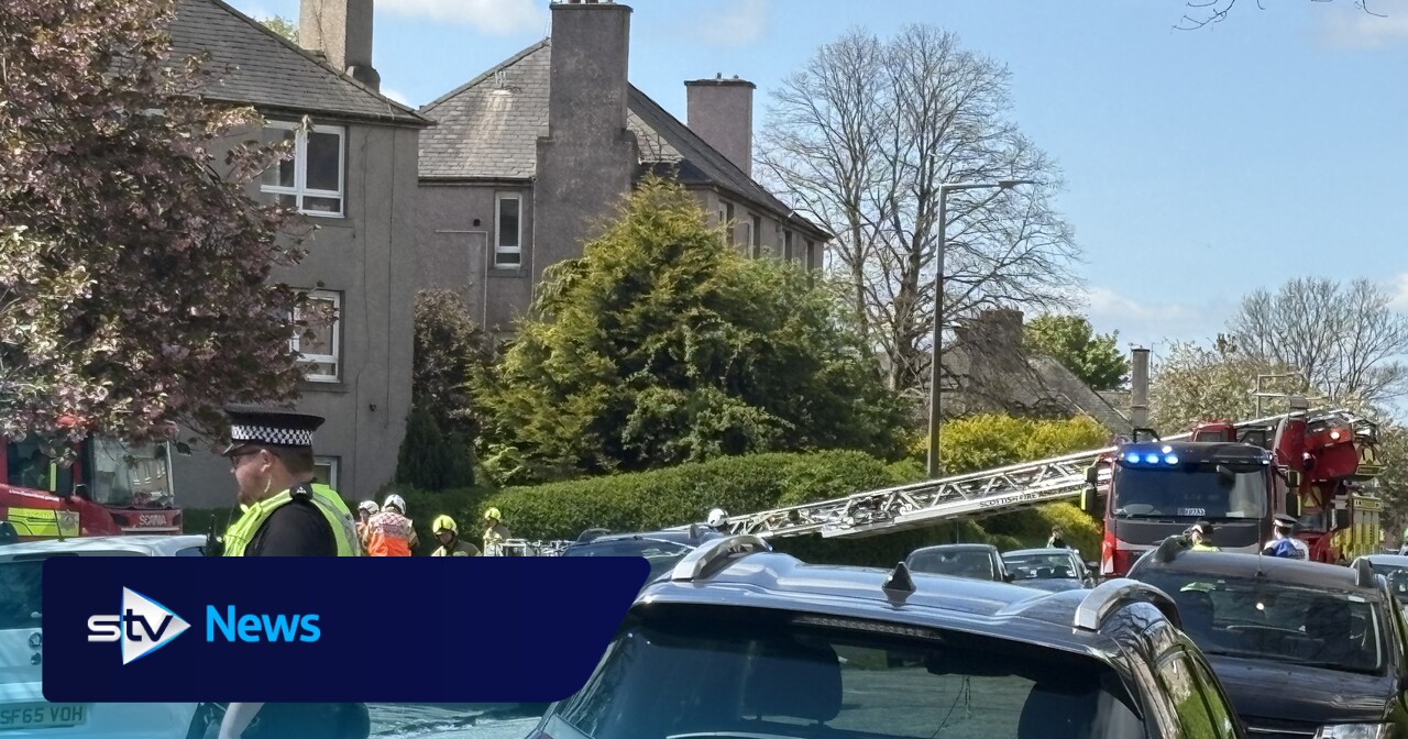 Firefighters battle blaze at Edinburgh block of flats as roads closed ...